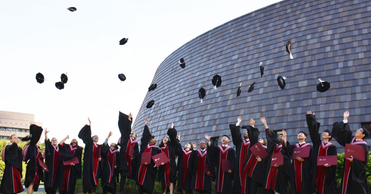 Graduate students throwing caps at Graduation Ceremony 2018 | Okinawa ...